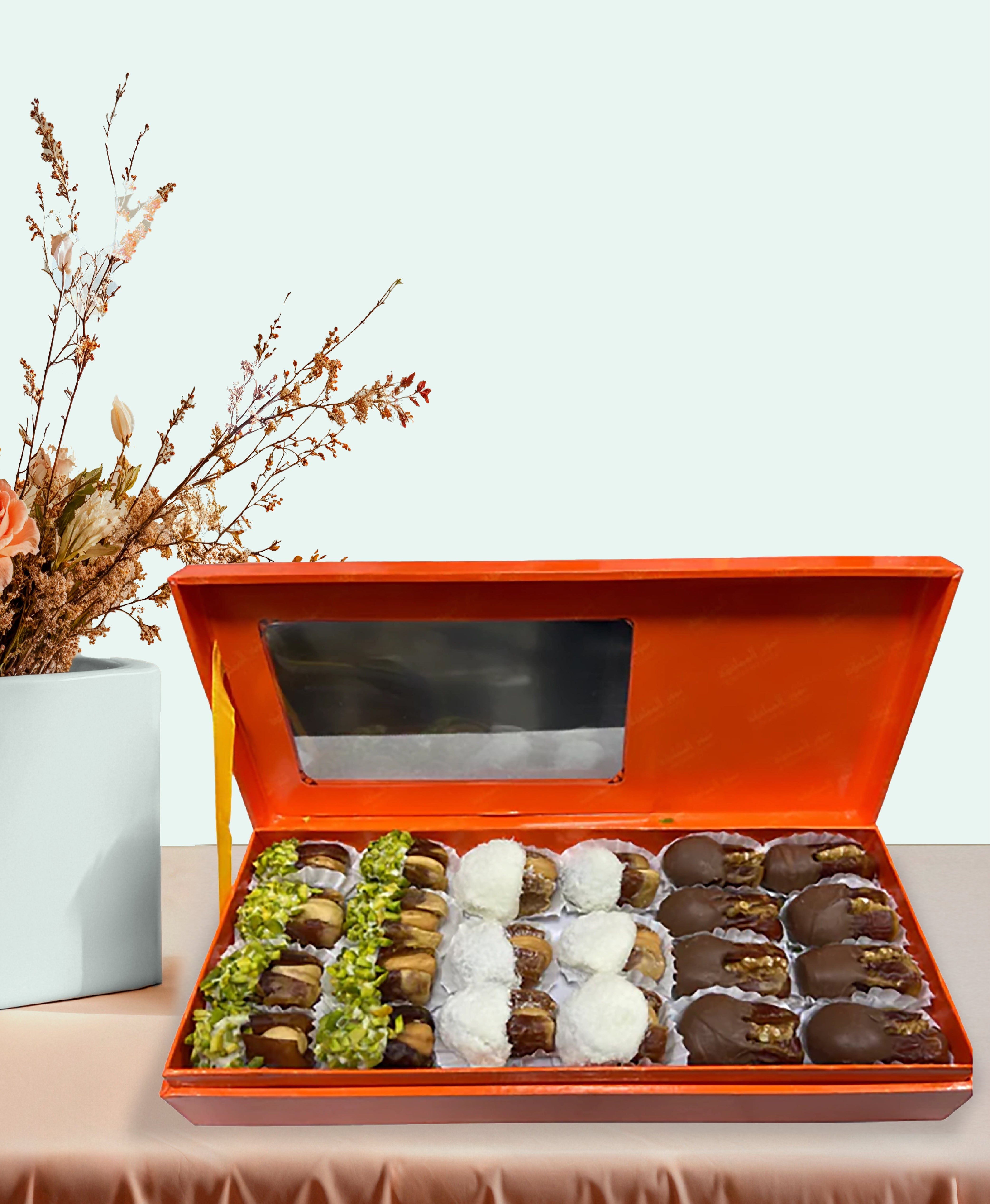 Box Filled With Half Coated Chocolate Dates